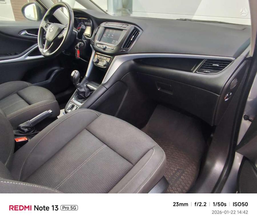 Grey Opel Zafira Tourer 2018 in Kaunas, with an engine capacity of 1.40 L and mileage of 212 thousand km for 7950 €, photo 19 on AUTOMOTO.COM.LV