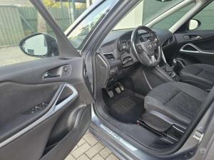 Grey Opel Zafira Tourer 2019 in Kedainiai, with an engine capacity of 1.60 L and mileage of 211 thousand km for 8900 €, photo 13 on AUTOMOTO.COM.LV