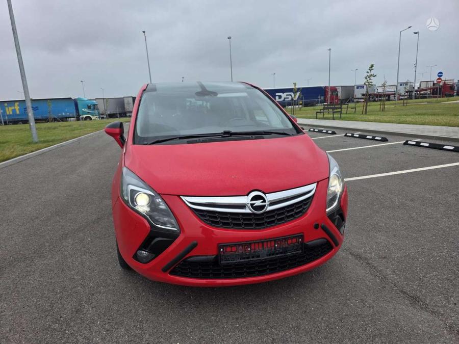 Sarkans Opel Zafira Tourer 2012 Marijampole, ar dzinēja tilpumu 1.36 L un nobraukumu 195 tūkst. km par 3650 €, foto 4 vietnē AUTOMOTO.COM.LV