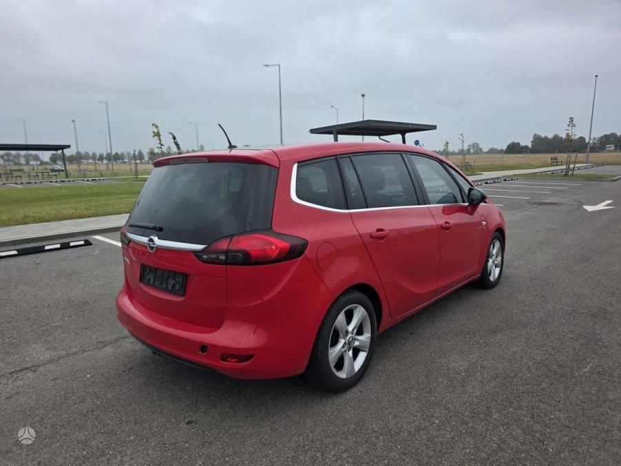 Sarkans Opel Zafira Tourer 2012 Marijampole, ar dzinēja tilpumu 1.36 L un nobraukumu 195 tūkst. km par 3650 €, foto 15 vietnē AUTOMOTO.COM.LV