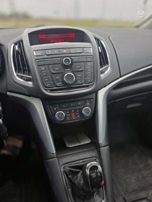 Sarkans Opel Zafira Tourer 2012 Marijampole, ar dzinēja tilpumu 1.36 L un nobraukumu 195 tūkst. km par 3650 €, foto 24 vietnē AUTOMOTO.COM.LV
