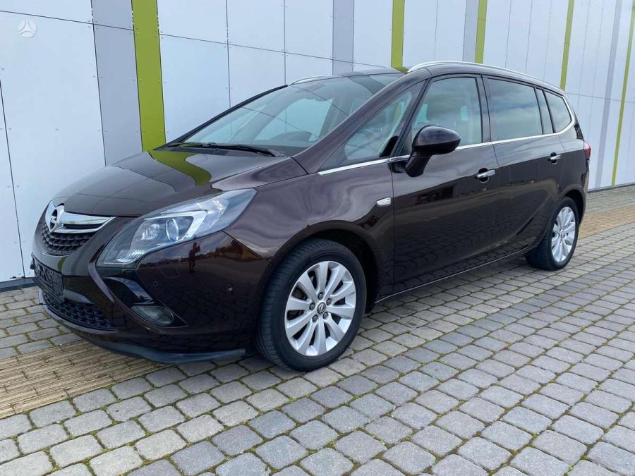 Sarkans Opel Zafira Tourer 2012 Raseiniai, ar dzinēja tilpumu 1.96 L un nobraukumu 300 tūkst. km par 4300 €, foto 1 vietnē AUTOMOTO.COM.LV