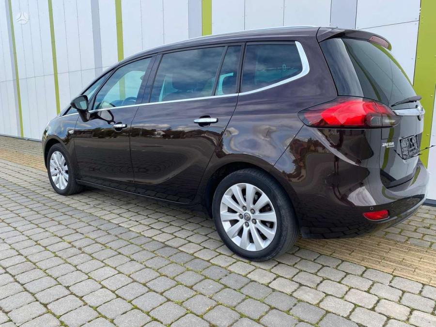 Sarkans Opel Zafira Tourer 2012 Raseiniai, ar dzinēja tilpumu 1.96 L un nobraukumu 300 tūkst. km par 4300 €, foto 4 vietnē AUTOMOTO.COM.LV