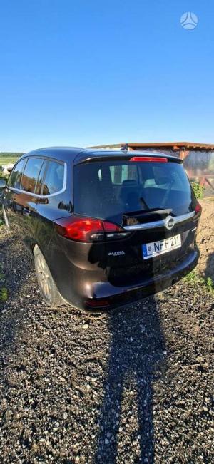 Sarkans Opel Zafira Tourer 2013 Kaišiadorys, ar dzinēja tilpumu 1.60 L un nobraukumu 351 tūkst. km par 2750 €, foto 5 vietnē AUTOMOTO.COM.LV