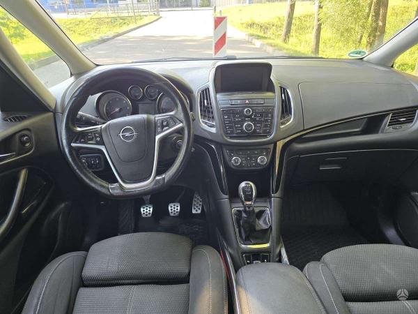 Violet Opel Zafira Tourer 2012 in Ukmerge, with an engine capacity of 1.96 L and mileage of 305 thousand km for 3950 €, photo 9 on AUTOMOTO.COM.LV