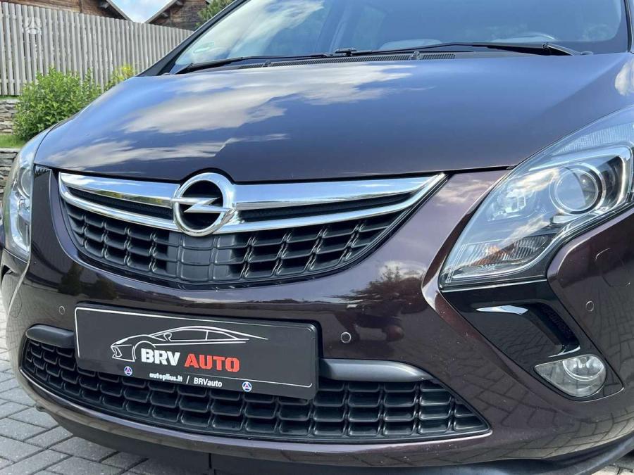 Violet Opel Zafira Tourer 2012 in Kedainiai, with an engine capacity of 1.96 L and mileage of 260 thousand km for 6350 €, photo 13 on AUTOMOTO.COM.LV