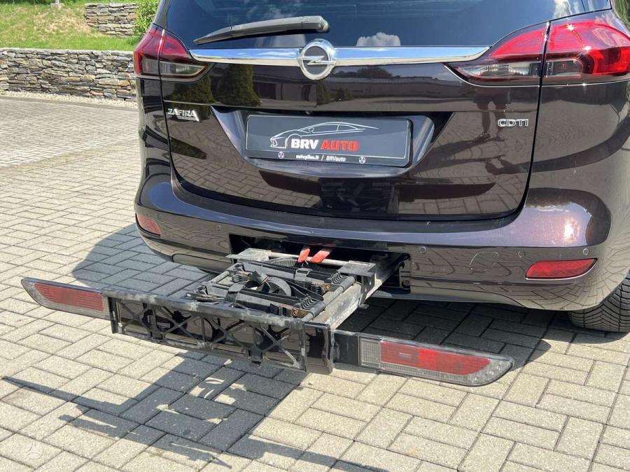 Violet Opel Zafira Tourer 2012 in Kedainiai, with an engine capacity of 1.96 L and mileage of 260 thousand km for 6350 €, photo 21 on AUTOMOTO.COM.LV