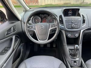 Violet Opel Zafira Tourer 2012 in Kedainiai, with an engine capacity of 1.96 L and mileage of 260 thousand km for 6350 €, photo 33 on AUTOMOTO.COM.LV
