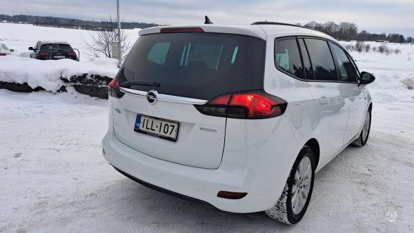 White Opel Zafira Tourer 2013 in Plunge, with an engine capacity of 1.96 L and mileage of 251 thousand km for 5700 €, photo 7 on AUTOMOTO.COM.LV