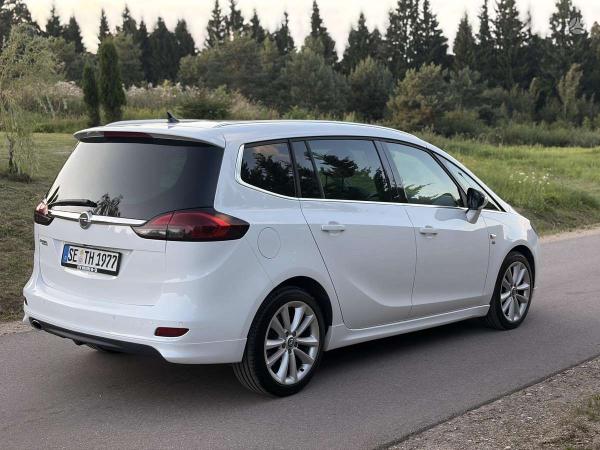 Balts Opel Zafira Tourer 2014 Viļņa, ar dzinēja tilpumu 1.96 L un nobraukumu 255 tūkst. km par 5850 €, foto 4 vietnē AUTOMOTO.COM.LV