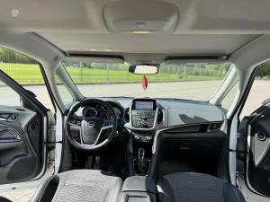 White Opel Zafira Tourer 2014 in Marijampole, with an engine capacity of 1.60 L and mileage of 250 thousand km for 6800 €, photo 18 on AUTOMOTO.COM.LV
