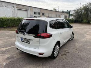 White Opel Zafira Tourer 2014 in Kaunas, with an engine capacity of 1.96 L and mileage of 287 thousand km for 5350 €, photo 3 on AUTOMOTO.COM.LV