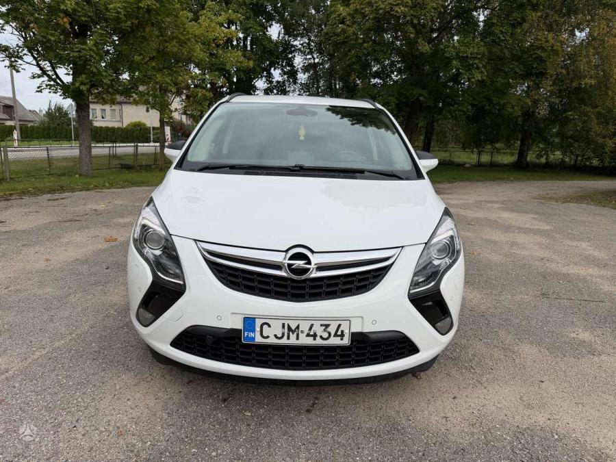 White Opel Zafira Tourer 2014 in Kaunas, with an engine capacity of 1.96 L and mileage of 287 thousand km for 5350 €, photo 6 on AUTOMOTO.COM.LV