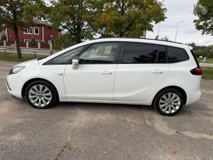 White Opel Zafira Tourer 2014 in Kaunas, with an engine capacity of 1.96 L and mileage of 287 thousand km for 5350 €, photo 9 on AUTOMOTO.COM.LV