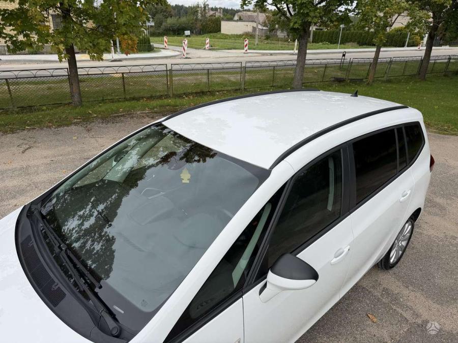 White Opel Zafira Tourer 2014 in Kaunas, with an engine capacity of 1.96 L and mileage of 287 thousand km for 5350 €, photo 12 on AUTOMOTO.COM.LV