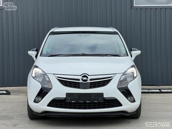 White Opel Zafira Tourer 2015 in Taurage, with an engine capacity of 2.00 L and mileage of 261 thousand km for 5700 €, photo 4 on AUTOMOTO.COM.LV