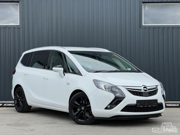 White Opel Zafira Tourer 2015 in Taurage, with an engine capacity of 2.00 L and mileage of 261 thousand km for 5700 €, photo 5 on AUTOMOTO.COM.LV
