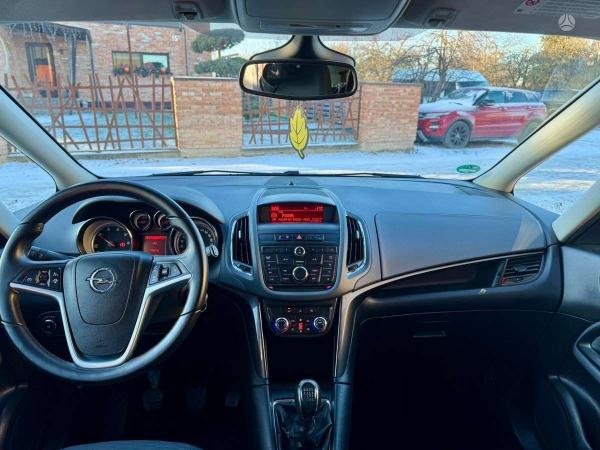 Yellow Opel Zafira Tourer 2014 in Marijampole, with an engine capacity of 1.96 L and mileage of 346 thousand km for 5650 €, photo 11 on AUTOMOTO.COM.LV