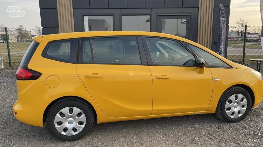Yellow Opel Zafira Tourer 2016 in Marijampole, with an engine capacity of 1.60 L and mileage of 253 thousand km for 5350 €, photo 5 on AUTOMOTO.COM.LV