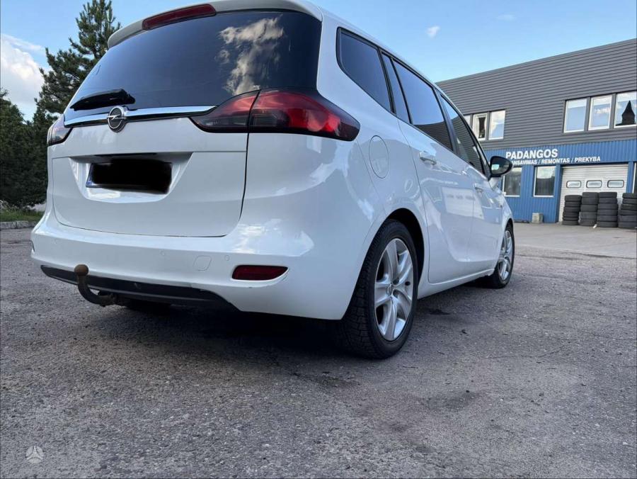 White Opel Zafira 2013 in Kaunas, with an engine capacity of 1.96 L and mileage of 345 thousand km for 2500 €, photo 7 on AUTOMOTO.COM.LV