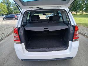 White Opel Zafira 2011 in Taurage, with an engine capacity of 1.69 L and mileage of 259 thousand km for 2400 €, photo 9 on AUTOMOTO.COM.LV