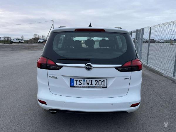 Balts Opel Zafira 2013 Panevēža, ar dzinēja tilpumu 2.00 L un nobraukumu 243 tūkst. km par 4500 €, foto 5 vietnē AUTOMOTO.COM.LV
