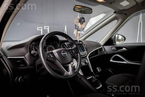 White Opel Zafira 2017 in Riga, with an engine capacity of 1.60 L and mileage of 198 thousand km for 8490 €, photo 9 on AUTOMOTO.COM.LV