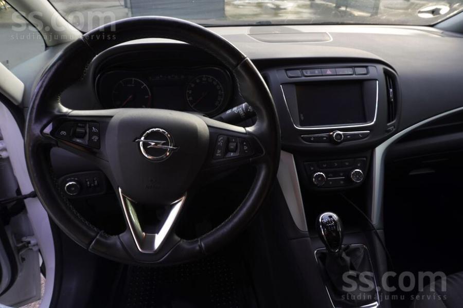 White Opel Zafira 2018 in Riga, with an engine capacity of 1.60 L and mileage of 158 thousand km for 7950 €, photo 9 on AUTOMOTO.COM.LV