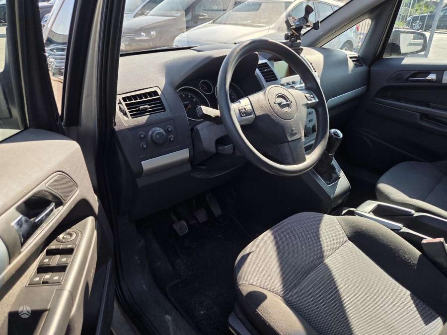 Yellow Opel Zafira 2009 in Marijampole, with an engine capacity of 1.60 L and mileage of 226 thousand km for 1899 €, photo 11 on AUTOMOTO.COM.LV