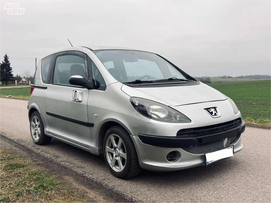 Pelēks Peugeot 1007 2005 Marijampole, ar dzinēja tilpumu 1.40 L un nobraukumu 164 tūkst. km par 750 €, foto 2 vietnē AUTOMOTO.COM.LV