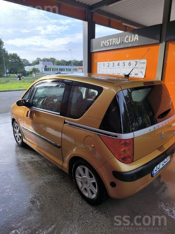 Oranžs Peugeot 1007 2006 Rīga, ar dzinēja tilpumu 1.30 L un nobraukumu 228 tūkst. km par 1500 €, foto 4 vietnē AUTOMOTO.COM.LV
