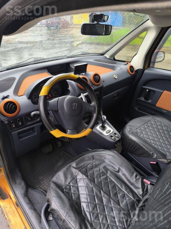 Oranžs Peugeot 1007 2006 Rīga, ar dzinēja tilpumu 1.30 L un nobraukumu 228 tūkst. km par 1500 €, foto 7 vietnē AUTOMOTO.COM.LV