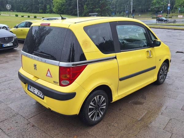 Yellow Peugeot 1007 2006 in Vilnius, with an engine capacity of 1.40 L and mileage of 193 thousand km for 650 €, photo 3 on AUTOMOTO.COM.LV