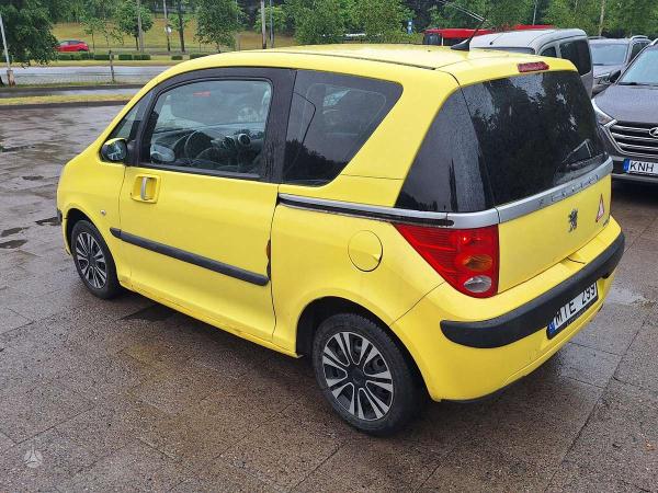 Yellow Peugeot 1007 2006 in Vilnius, with an engine capacity of 1.40 L and mileage of 193 thousand km for 650 €, photo 4 on AUTOMOTO.COM.LV