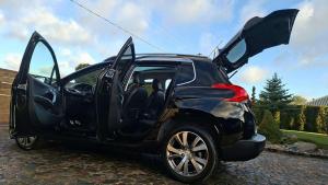Black Peugeot 2008 2013 in Kaunas, with an engine capacity of 1.56 L and mileage of 196 thousand km for 5350 €, photo 30 on AUTOMOTO.COM.LV