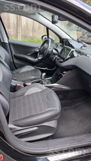 Black Peugeot 2008 2014 in Riga, with an engine capacity of 1.60 L and mileage of 220 thousand km for 6600 €, photo 12 on AUTOMOTO.COM.LV