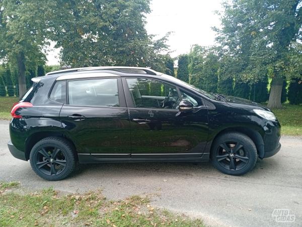 Black Peugeot 2008 2015 in Panevezys, with an engine capacity of 1.20 L and mileage of 145 thousand km for 3650 €, photo 6 on AUTOMOTO.COM.LV