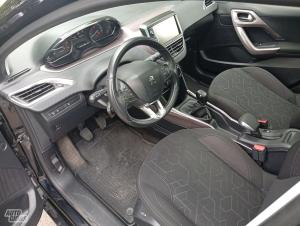 Black Peugeot 2008 2015 in Panevezys, with an engine capacity of 1.20 L and mileage of 145 thousand km for 3650 €, photo 14 on AUTOMOTO.COM.LV