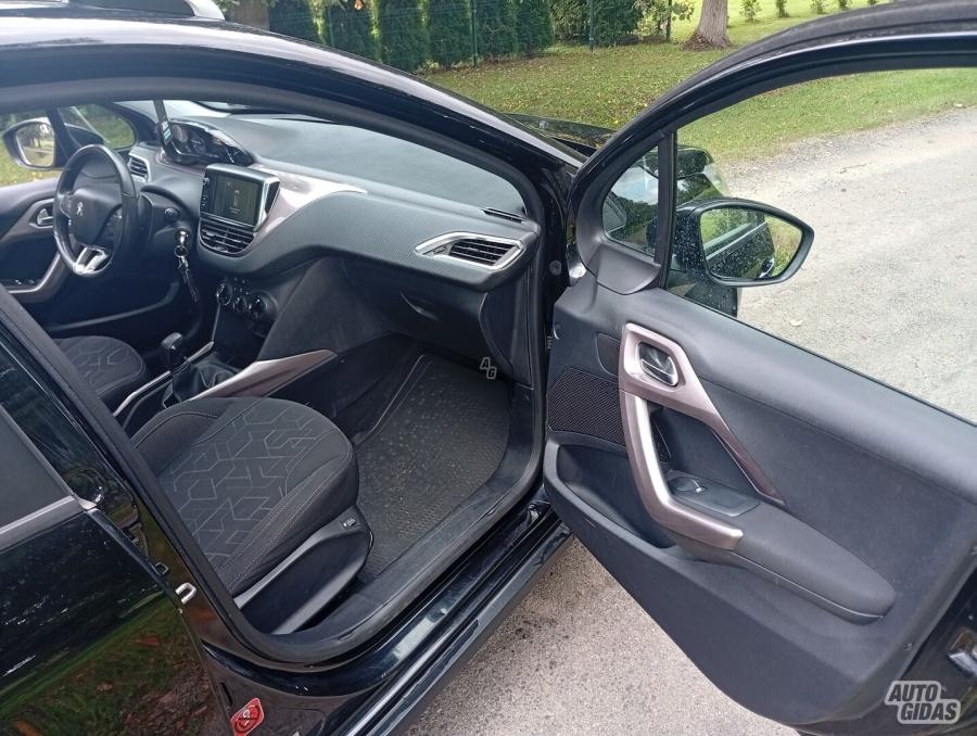 Black Peugeot 2008 2015 in Panevezys, with an engine capacity of 1.20 L and mileage of 145 thousand km for 3650 €, photo 19 on AUTOMOTO.COM.LV