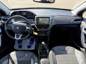 Black Peugeot 2008 2017 in Vilnius, with an engine capacity of 1.56 L and mileage of 226 thousand km for 5999 €, photo 16 on AUTOMOTO.COM.LV