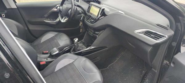 Black Peugeot 2008 2018 in Taurage, with an engine capacity of 1.20 L and mileage of 103 thousand km for 5699 €, photo 7 on AUTOMOTO.COM.LV