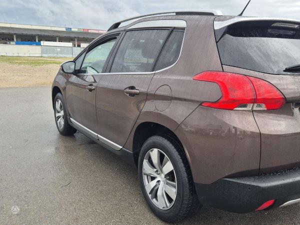 Brown Peugeot 2008 2014 in Siauliai, with an engine capacity of 1.20 L and mileage of 105 thousand km for 5350 €, photo 9 on AUTOMOTO.COM.LV