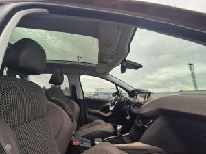 Brown Peugeot 2008 2014 in Siauliai, with an engine capacity of 1.20 L and mileage of 105 thousand km for 5350 €, photo 17 on AUTOMOTO.COM.LV