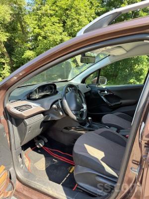 Brown Peugeot 2008 2014 in Bauska, with an engine capacity of 1.20 L and mileage of 236 thousand km for 6200 €, photo 9 on AUTOMOTO.COM.LV