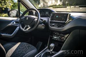 Green Peugeot 2008 2019 in Riga, with an engine capacity of 1.20 L and mileage of 124 thousand km for 7590 €, photo 8 on AUTOMOTO.COM.LV