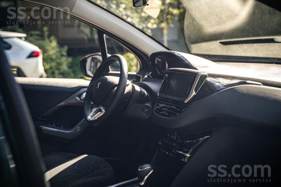 Green Peugeot 2008 2019 in Riga, with an engine capacity of 1.20 L and mileage of 124 thousand km for 7590 €, photo 11 on AUTOMOTO.COM.LV