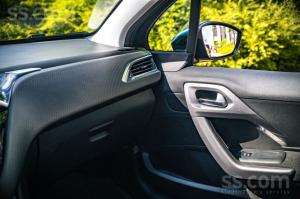 Green Peugeot 2008 2019 in Riga, with an engine capacity of 1.20 L and mileage of 124 thousand km for 7590 €, photo 14 on AUTOMOTO.COM.LV