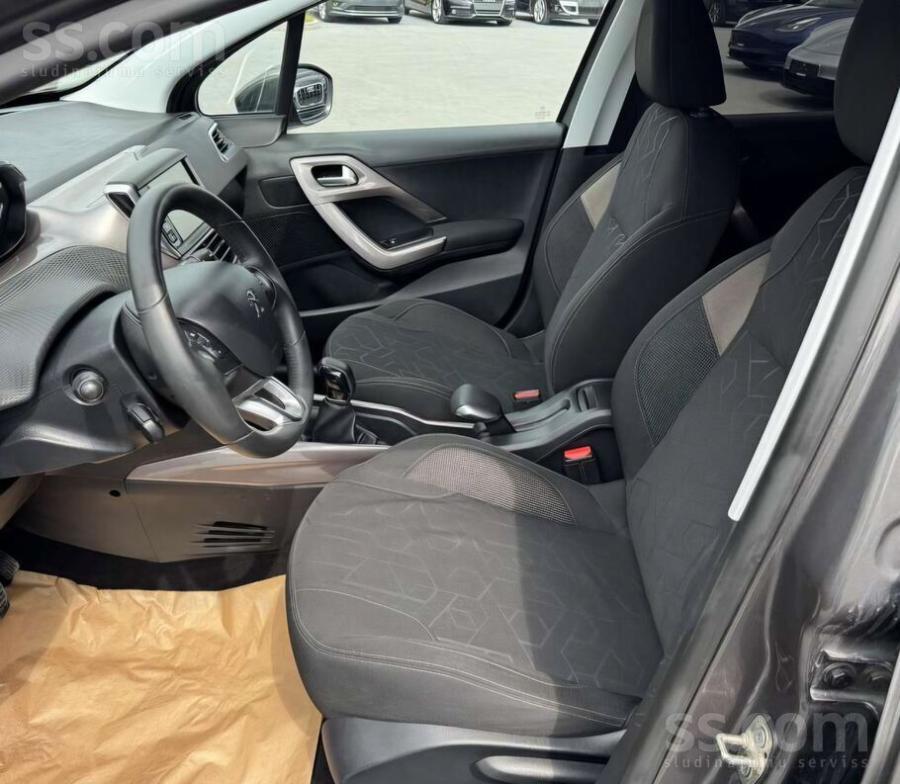 Grey Peugeot 2008 2013 in Telschi, with an engine capacity of 1.20 L and mileage of 153 thousand km for 5190 €, photo 12 on AUTOMOTO.COM.LV
