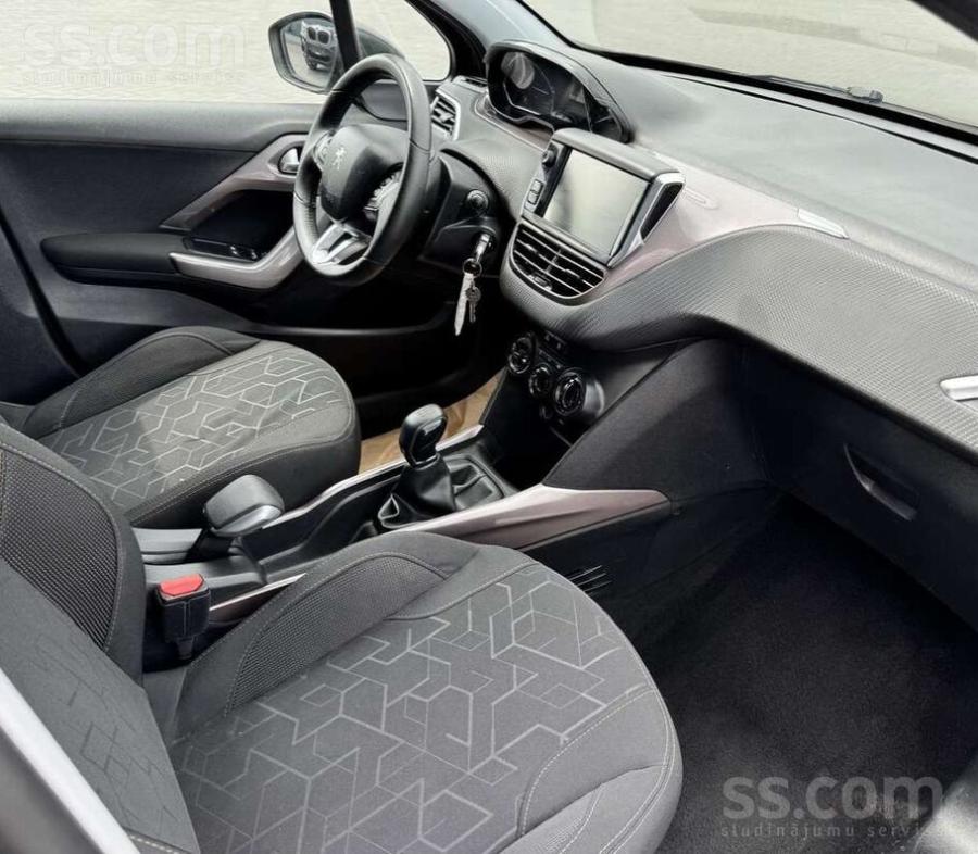 Grey Peugeot 2008 2013 in Telschi, with an engine capacity of 1.20 L and mileage of 153 thousand km for 5190 €, photo 13 on AUTOMOTO.COM.LV