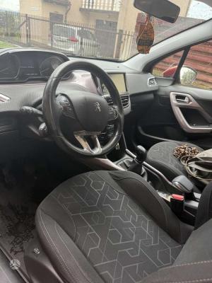 Orange Peugeot 2008 2015 in Kaunas, with an engine capacity of 1.40 L and mileage of 156 thousand km for 5500 €, photo 9 on AUTOMOTO.COM.LV